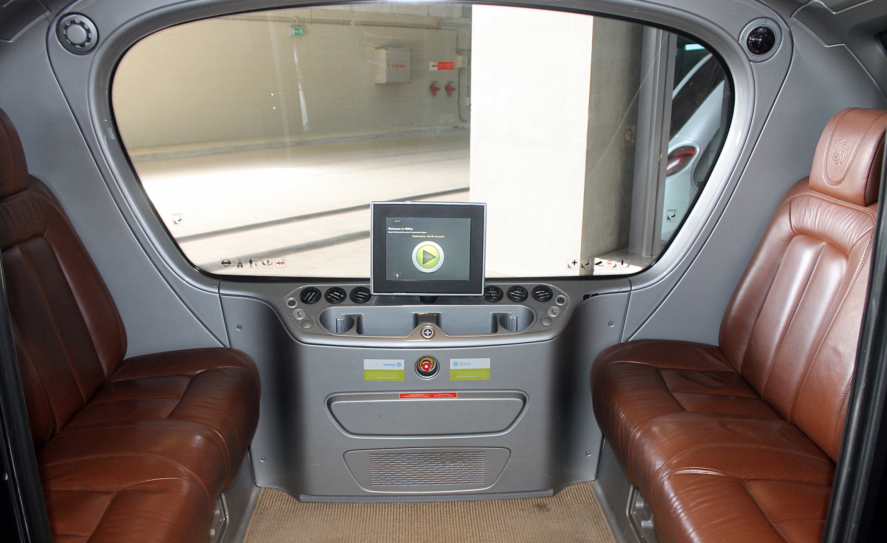 Buzzing around Masdar City in Electric Pod Cars – A reluctant wanderlust