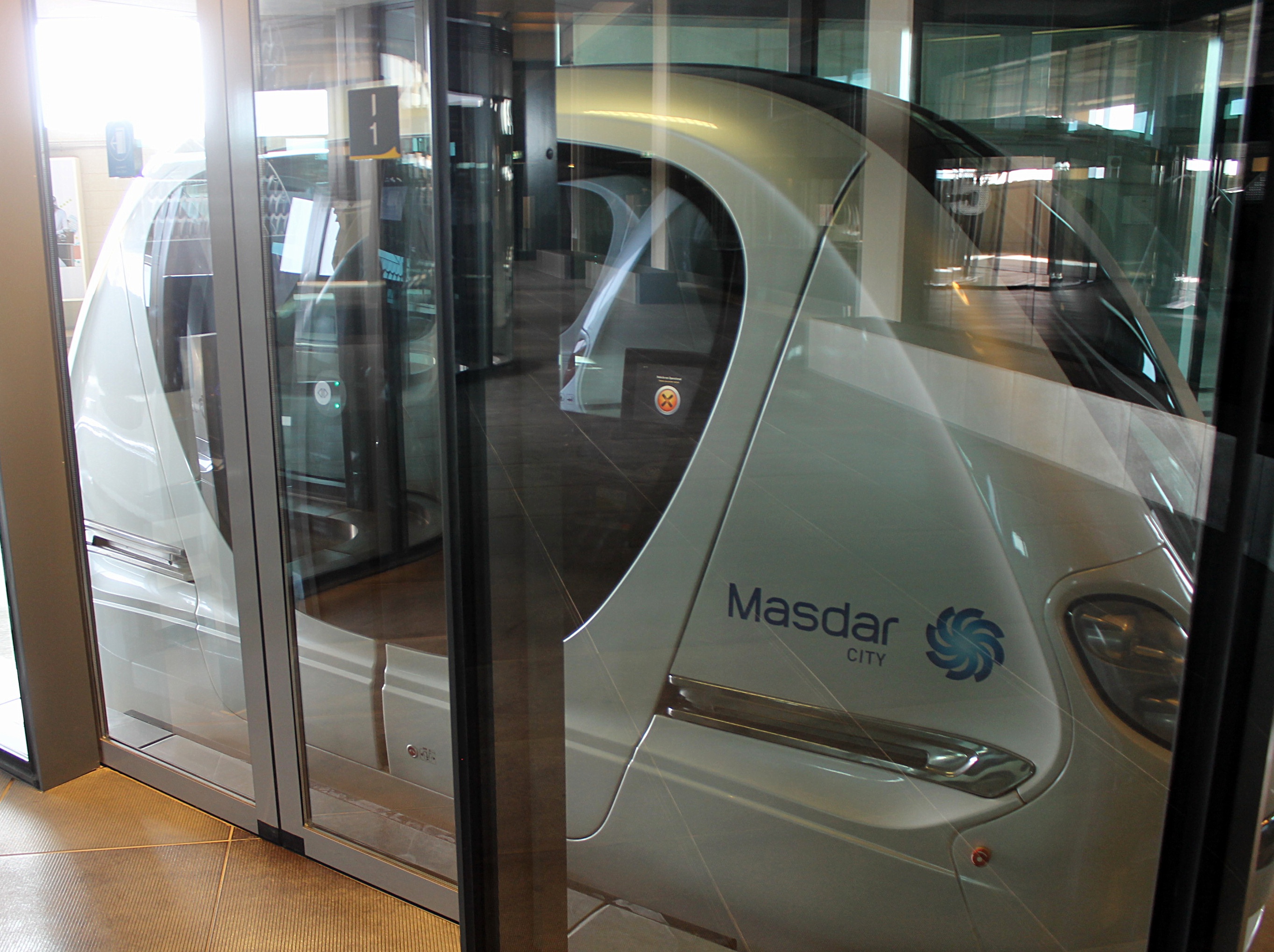 Buzzing around Masdar City in Electric Pod Cars – A reluctant wanderlust